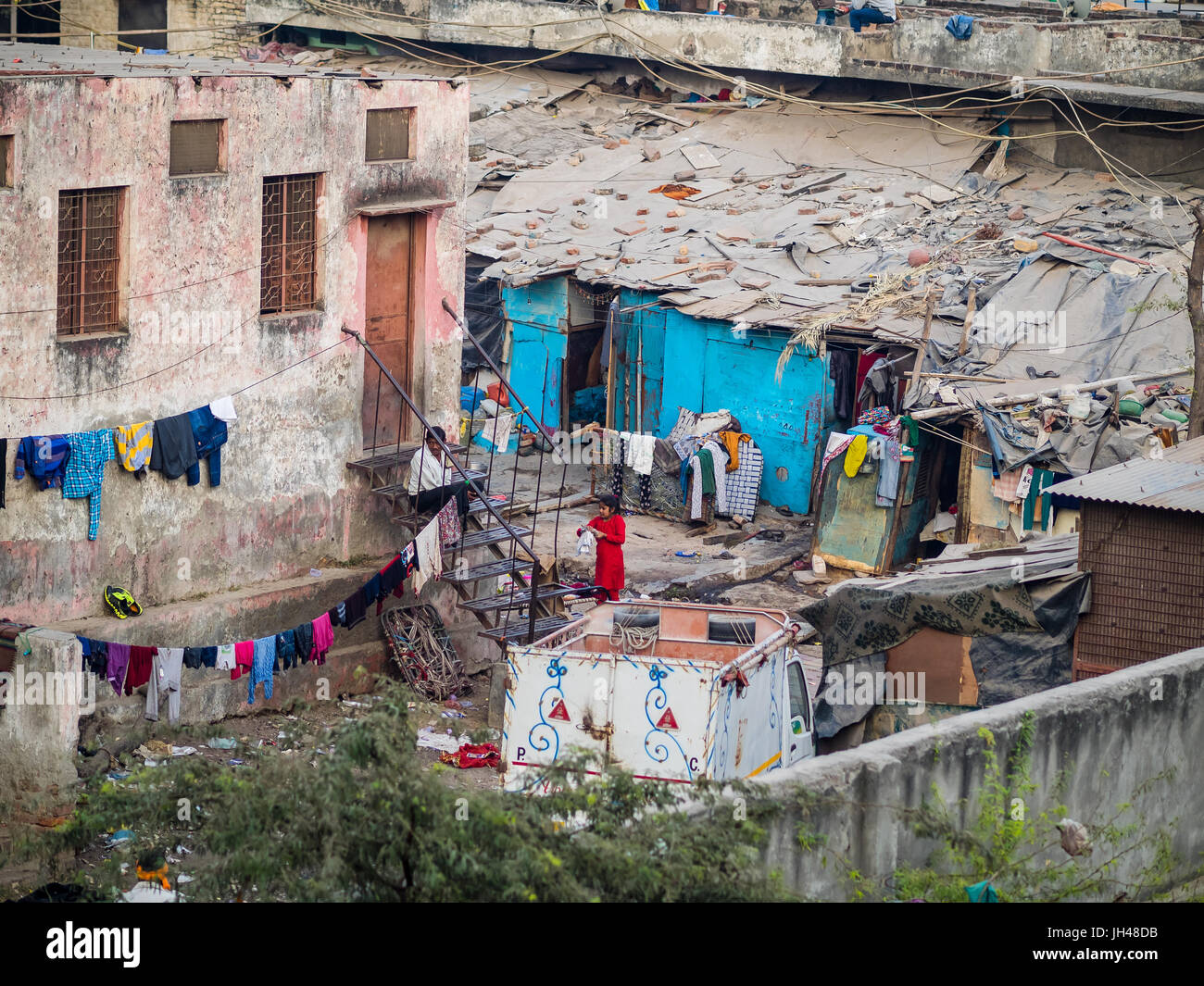 Delhi, India - December 27, 2015 - View on a rather poor area of DElhi ...