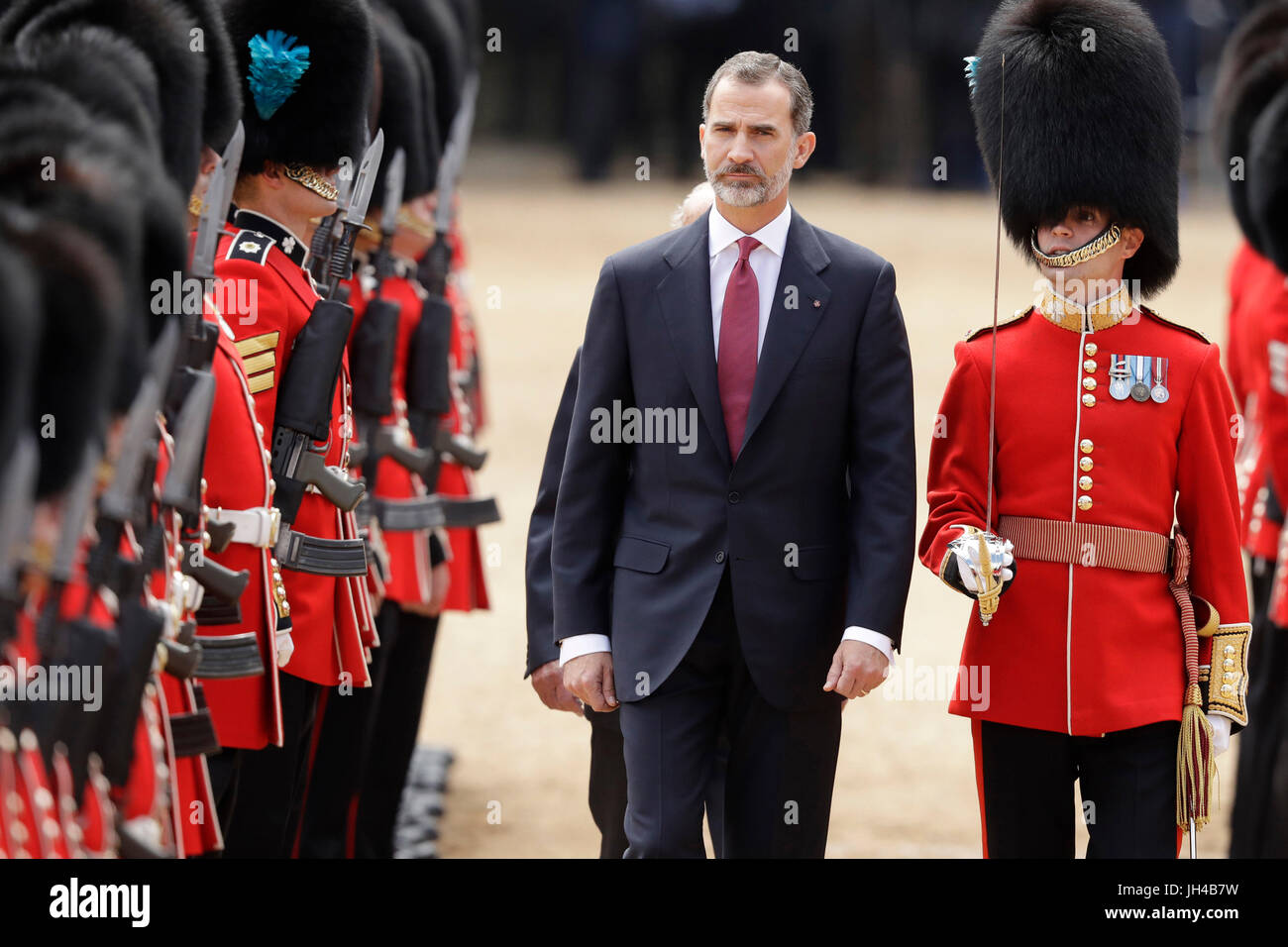 King Felipe VI of Spain inspects a guard of honour during a Ceremonial ...