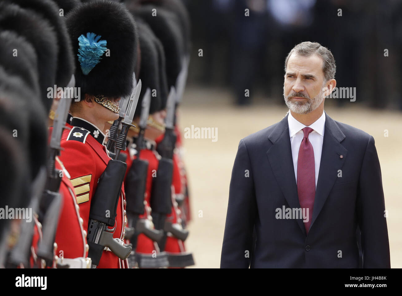 King Felipe VI of Spain inspects a guard of honour during a Ceremonial ...