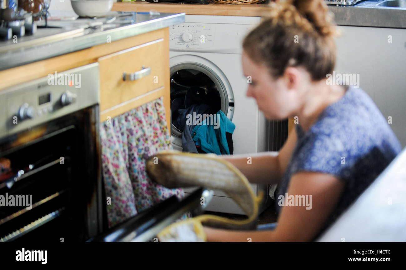 A washing machine pictured in a kitchen Stock Photo - Alamy