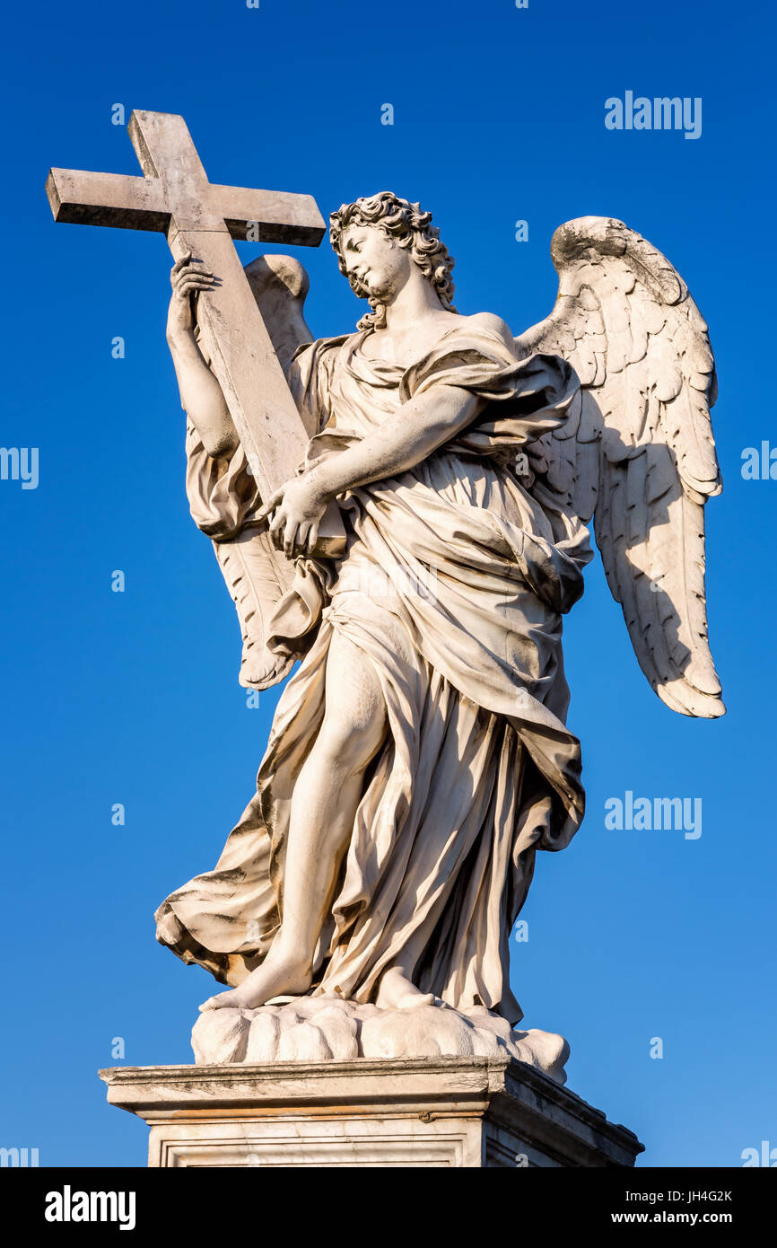 Angel with the cross hi-res stock photography and images - Alamy