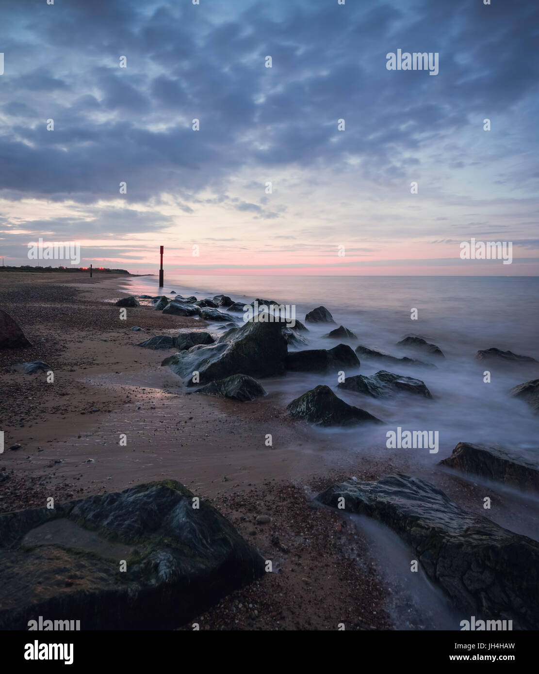 Rocks on the Norfolk Coast Stock Photo - Alamy