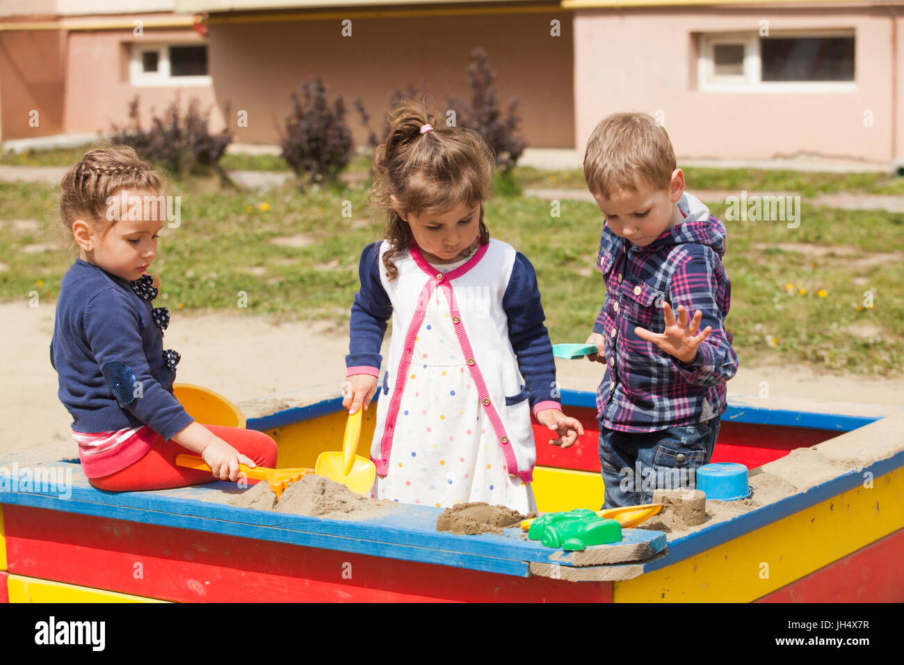 Children are playing at the playground with sand in the sandbox Stock ...