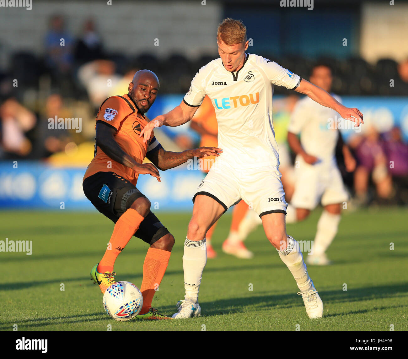 Barnet's Jamal Campbell-Ryce (left) and Swansea City's Jay Fulton ...