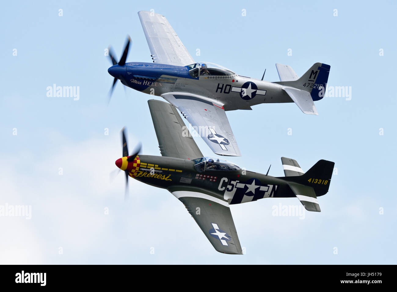 Pair of P-51 Mustang planes flying at an airshow Stock Photo - Alamy