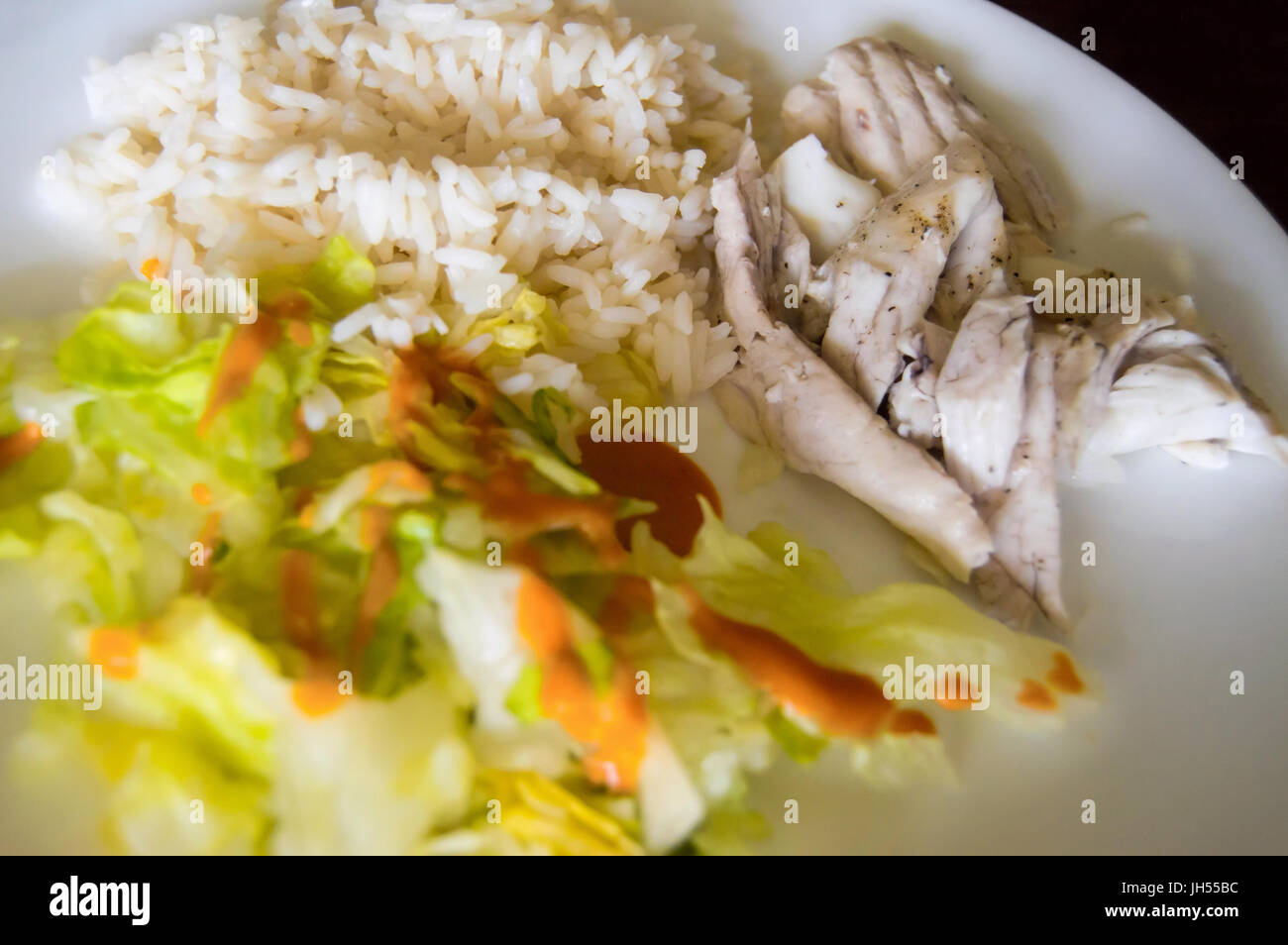 A meal of rice, salad and grouper fish Stock Photo - Alamy