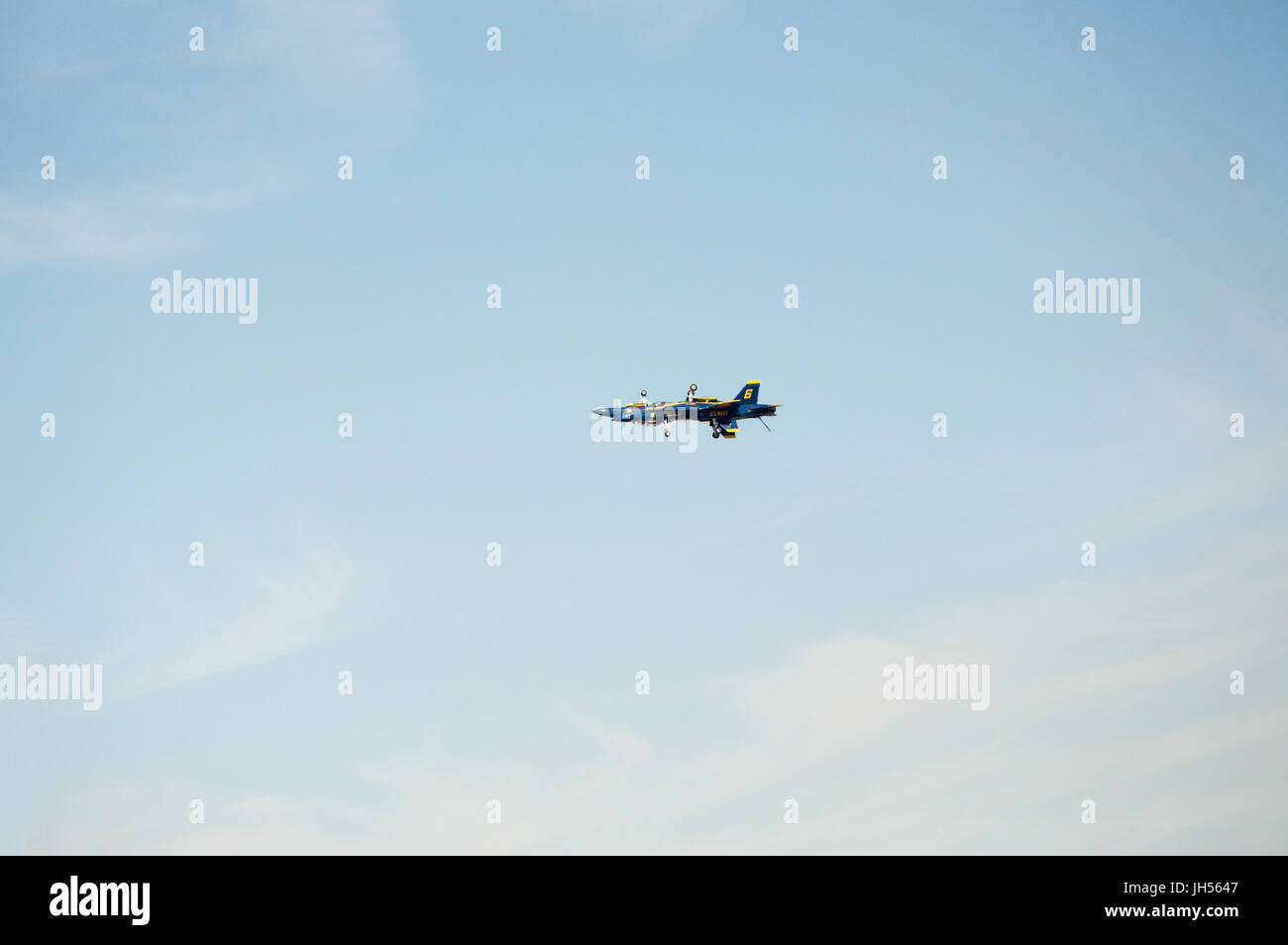 A blue angels jet flying over it's home base in Florida Stock Photo - Alamy