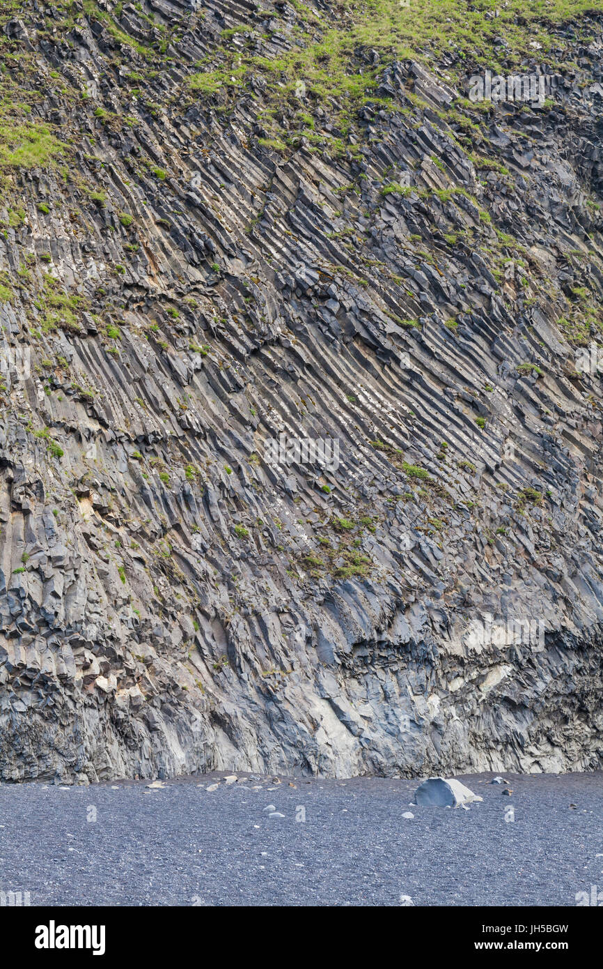 Exposed basalt formations on the Reynisfjara black sand beach in ...
