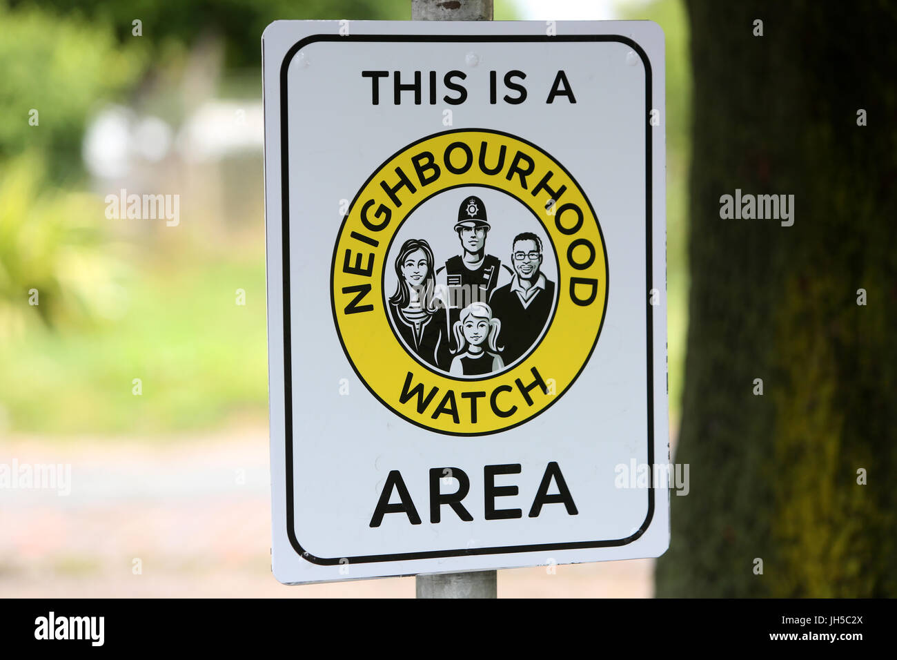 Members of a local Neighbourhood Watch pictured installing a sign in a ...