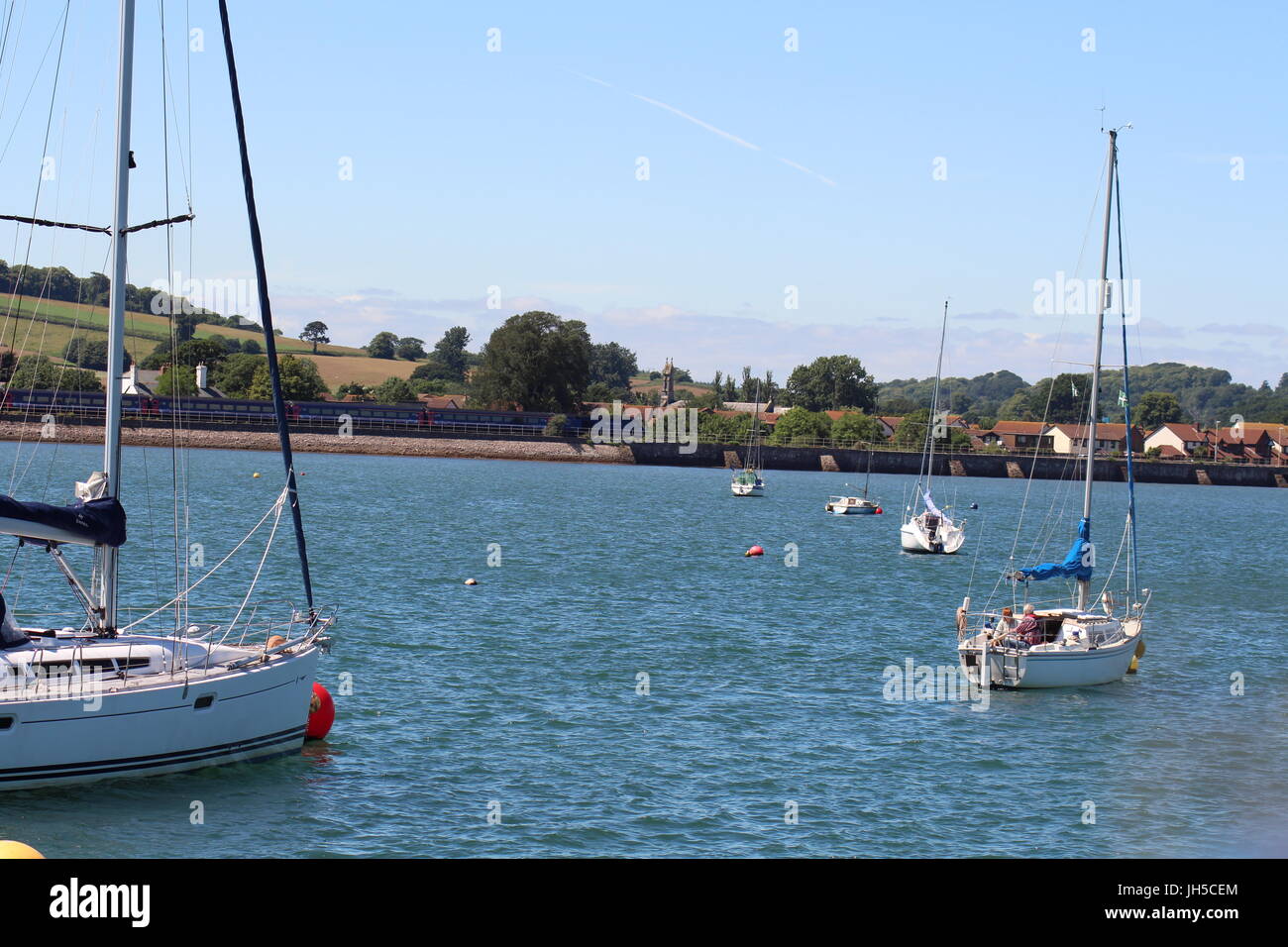 boats on river with train in background, transport, railway, train ...
