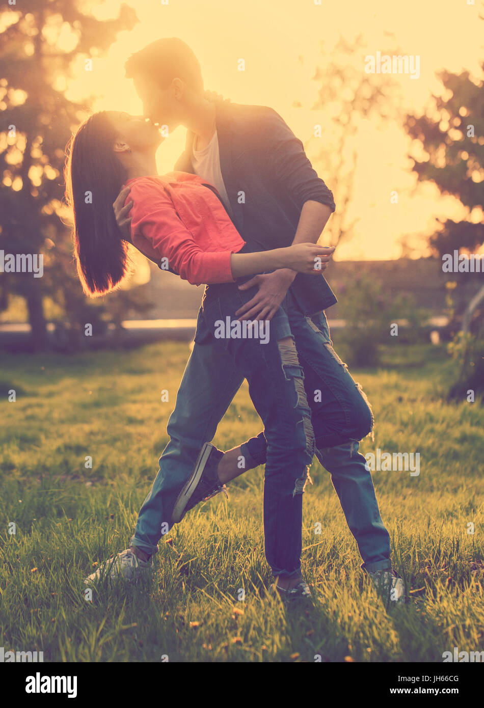 Strong man girl kiss in hi-res stock photography and images - Alamy
