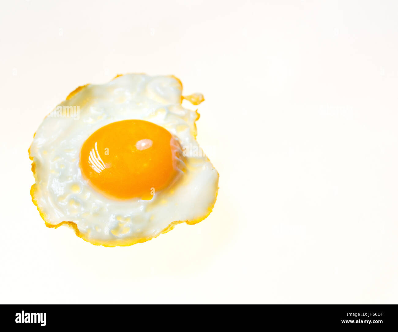 Photograph of a fried egg detail Stock Photo - Alamy