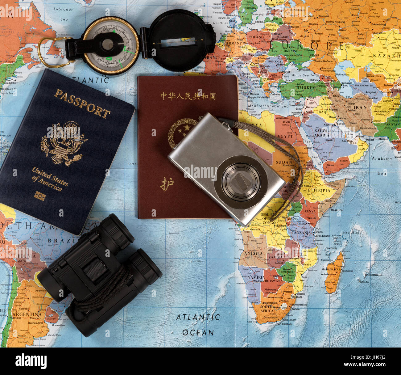 Multiple national passports for world travel Stock Photo - Alamy