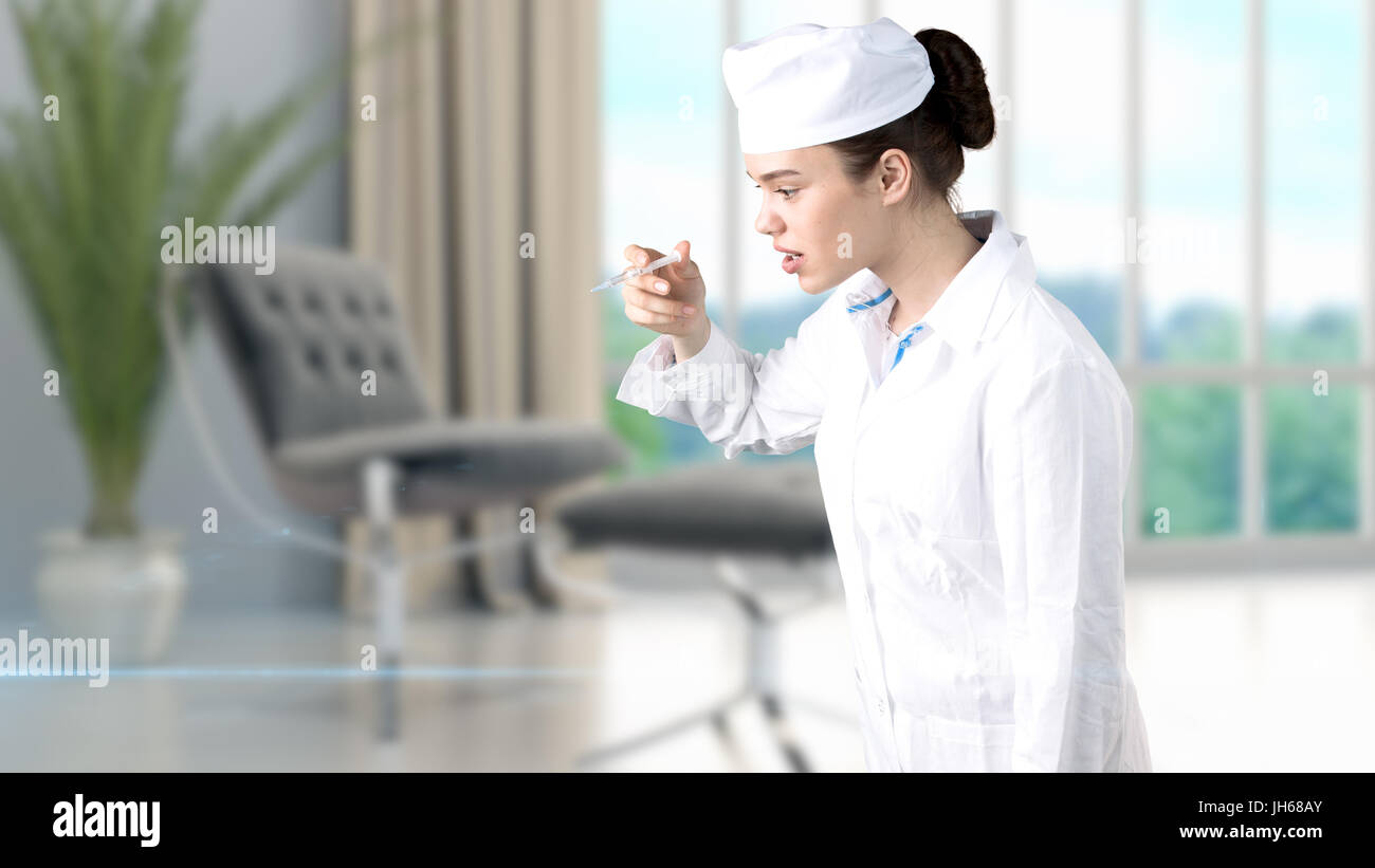 Beautiful medical woman doctor in uniform. Studio painted background ...