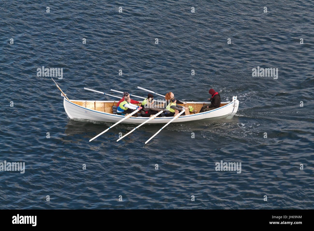 Wooden rowing boat Boat near the Faroe Islands Stock Photo - Alamy