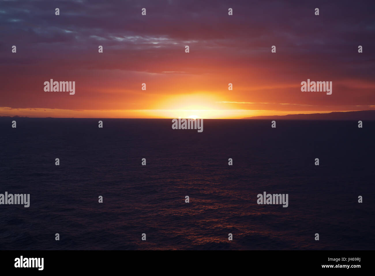 Sunset over the Atlantic Ocean Stock Photo - Alamy