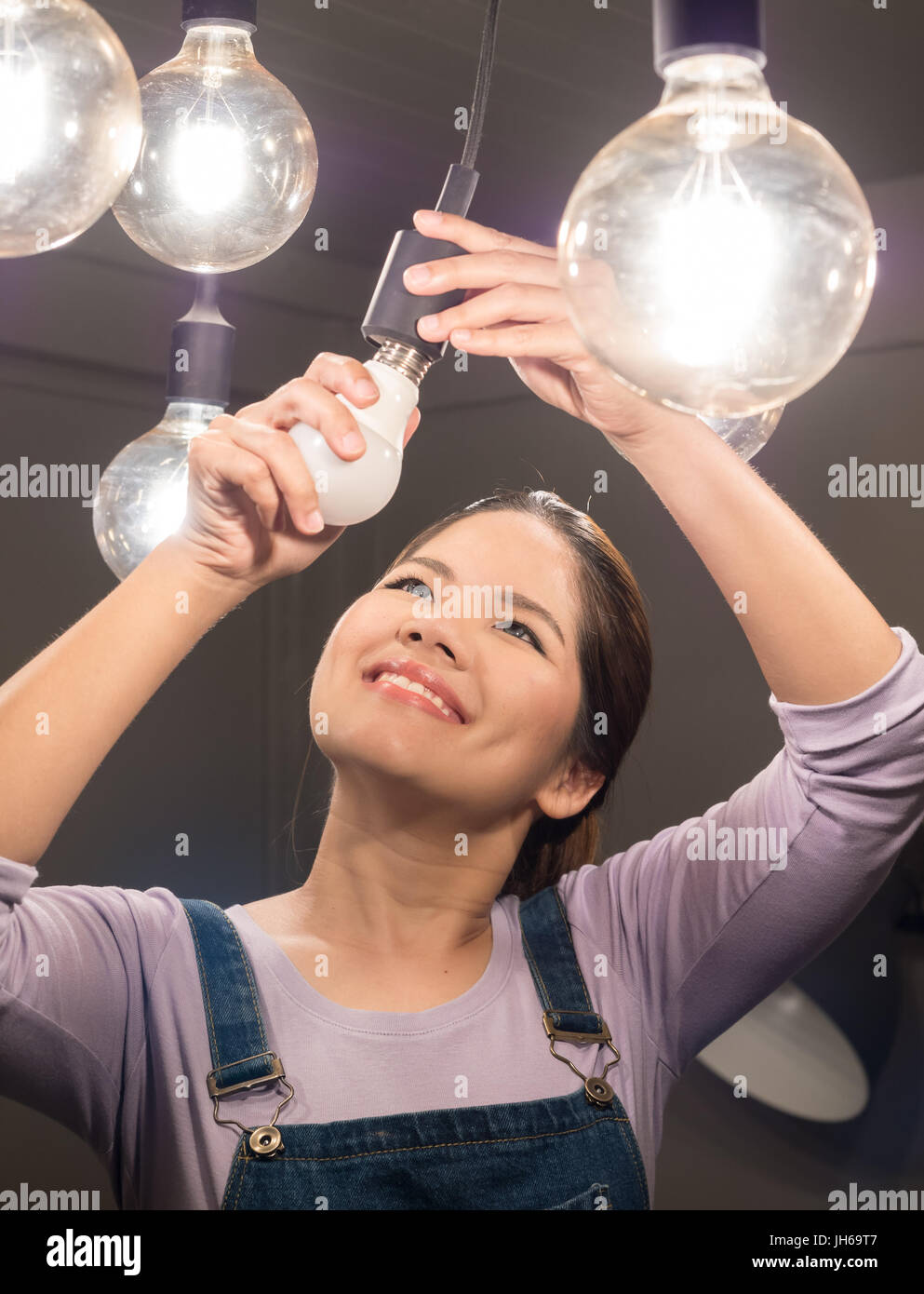 Changing lightbulb led hi-res stock photography and images - Alamy