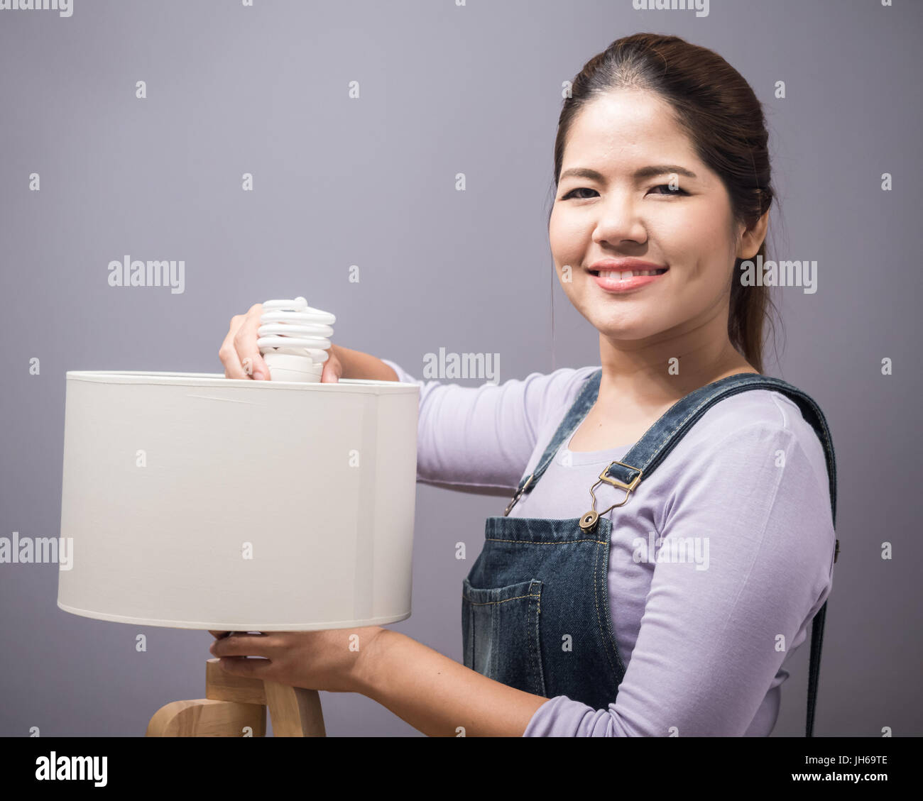 Woman changing hi-res stock photography and images - Alamy