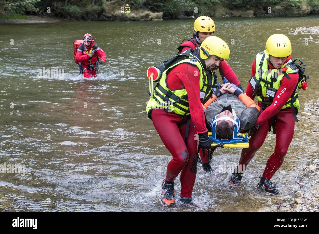 FIREFIGHTERS IN DANGEROUS PLACES Stock Photo - Alamy