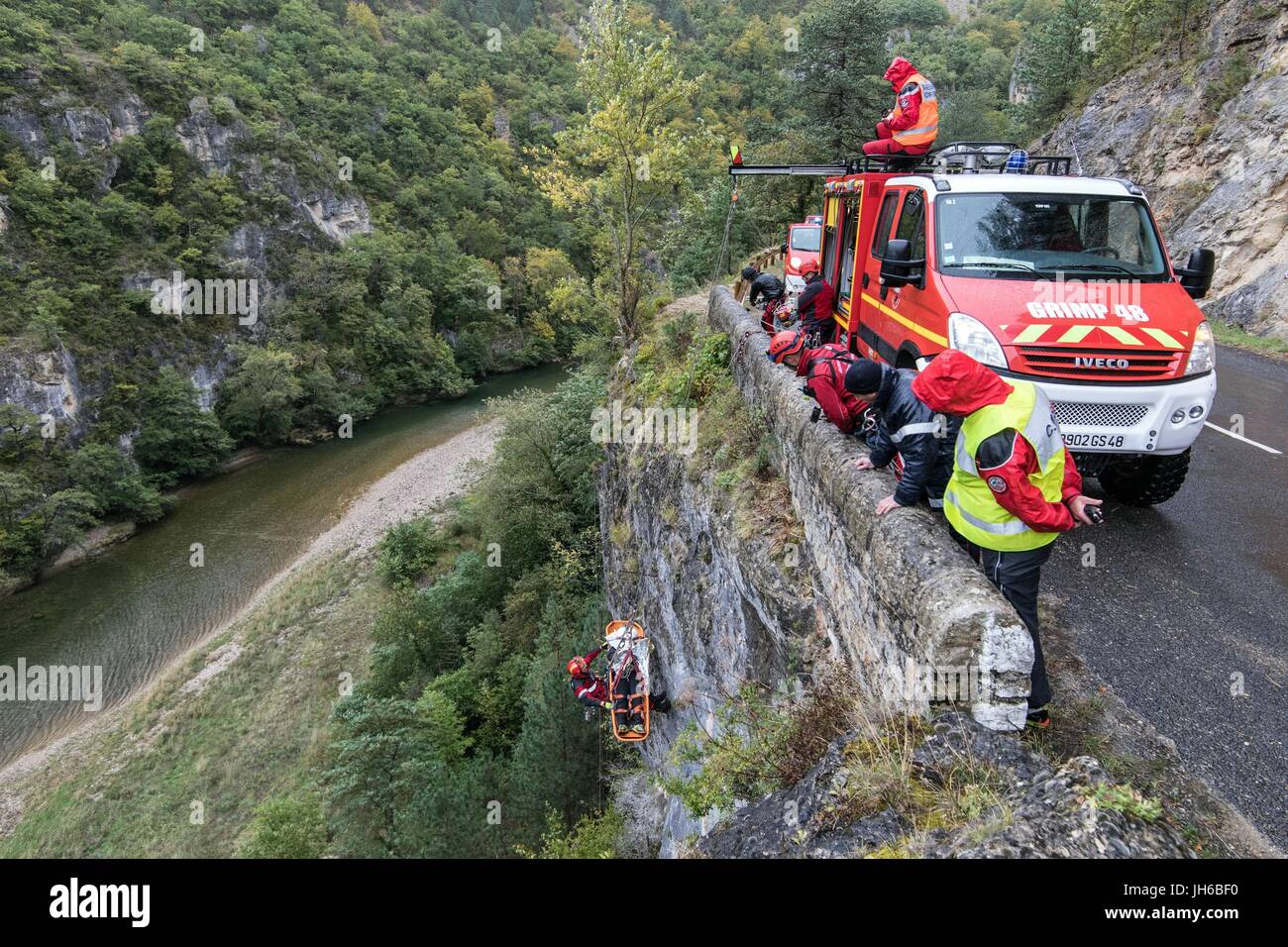 FIREFIGHTERS IN DANGEROUS PLACES Stock Photo - Alamy