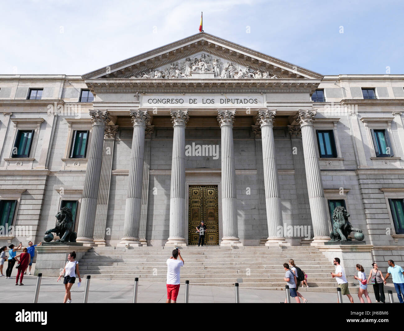 MADRID - JUNE 9: Tourists take a photograph of Congress of Deputies ...