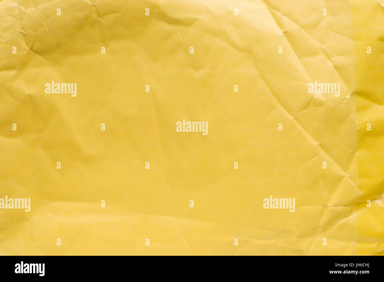 Yellow crumpled paper close up. Texture and background Stock Photo - Alamy