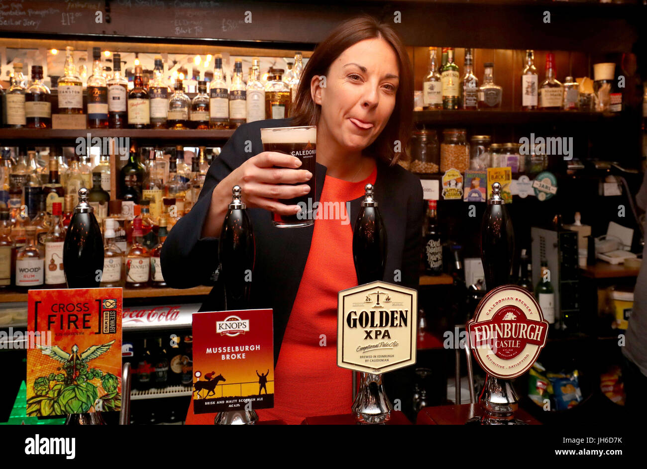 Scottish Labour leader Kezia Dugdale behind the bar of the Kilderkin ...