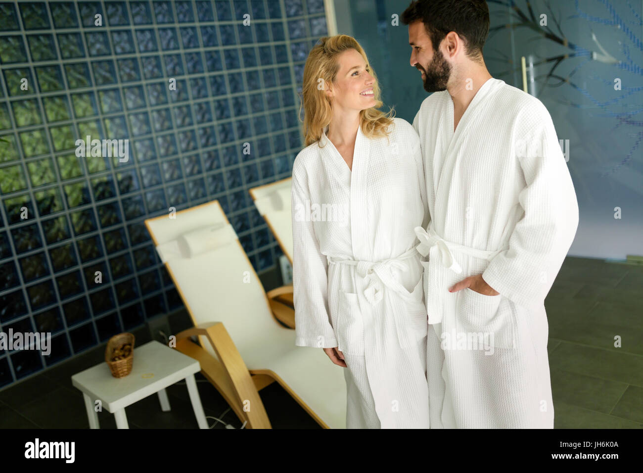 Beautiful cheerful couple relaxing in spa center Stock Photo - Alamy