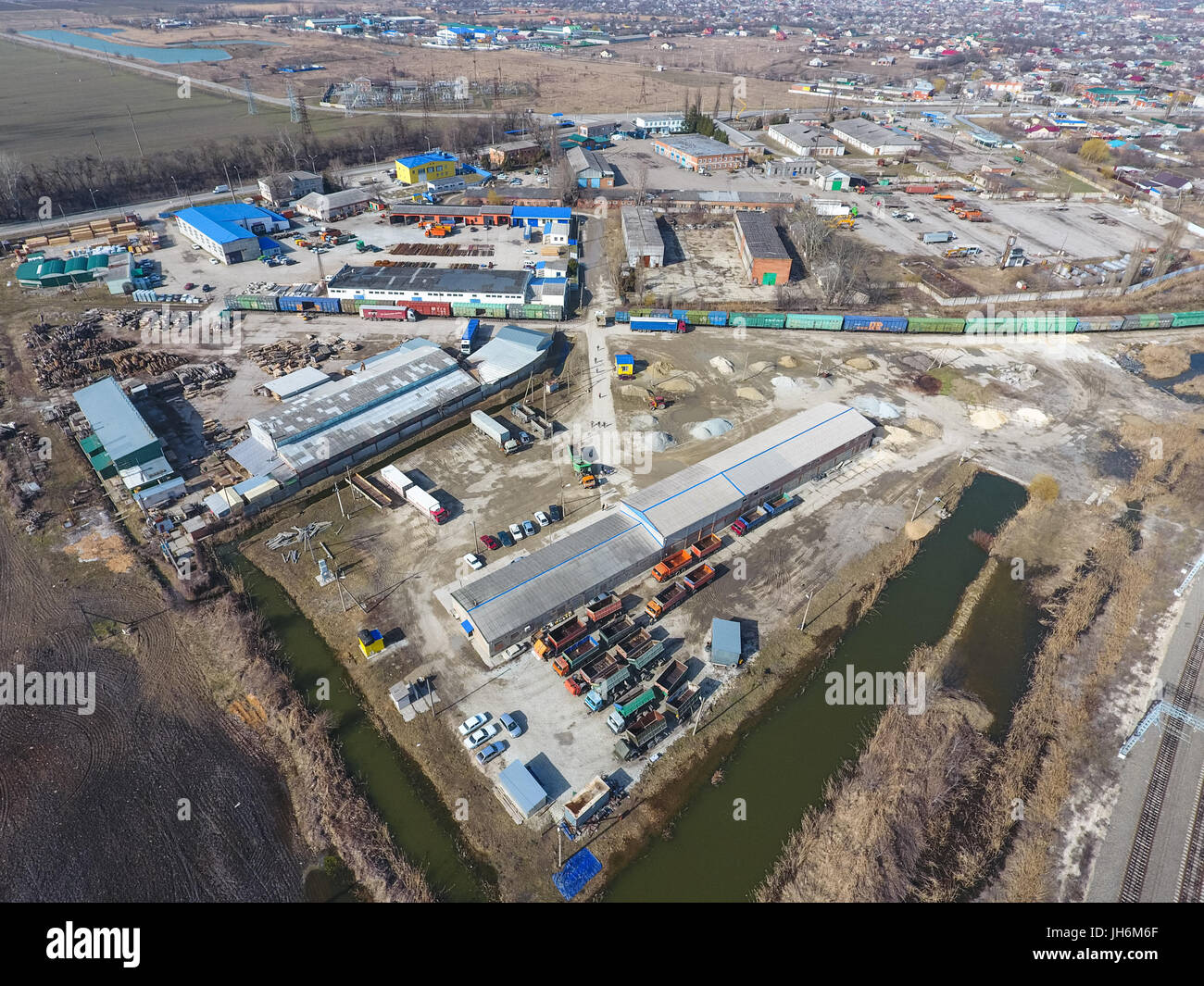 Top view of a construction site base. Sheds storage building materials ...