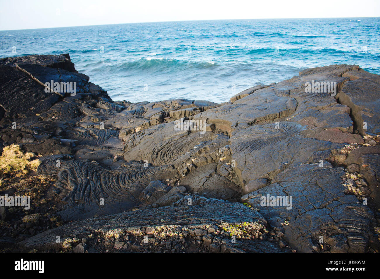 Lava Rock by the Ocean Stock Photo - Alamy