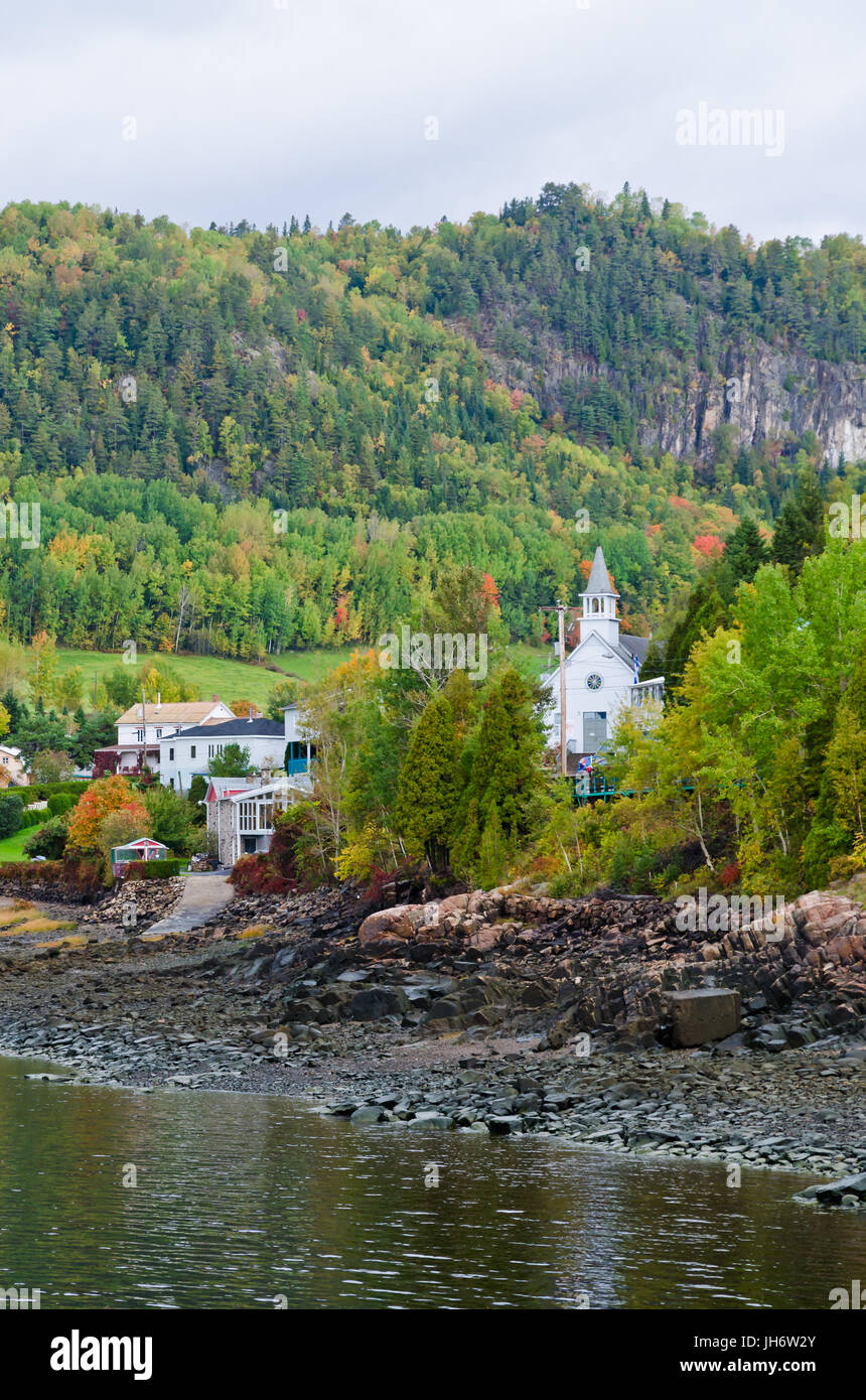 Beautiful homes on hillside surrounded by colorful autumn foliage Stock ...