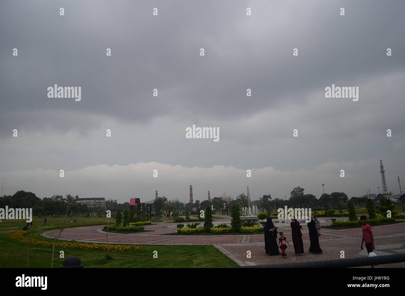 Lahore, Pakistan. 13th July, 2017. An eye catching view of dark clouds ...