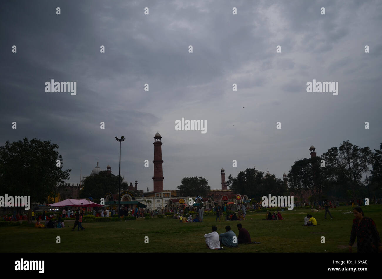Lahore, Pakistan. 13th July, 2017. An eye catching view of dark clouds ...