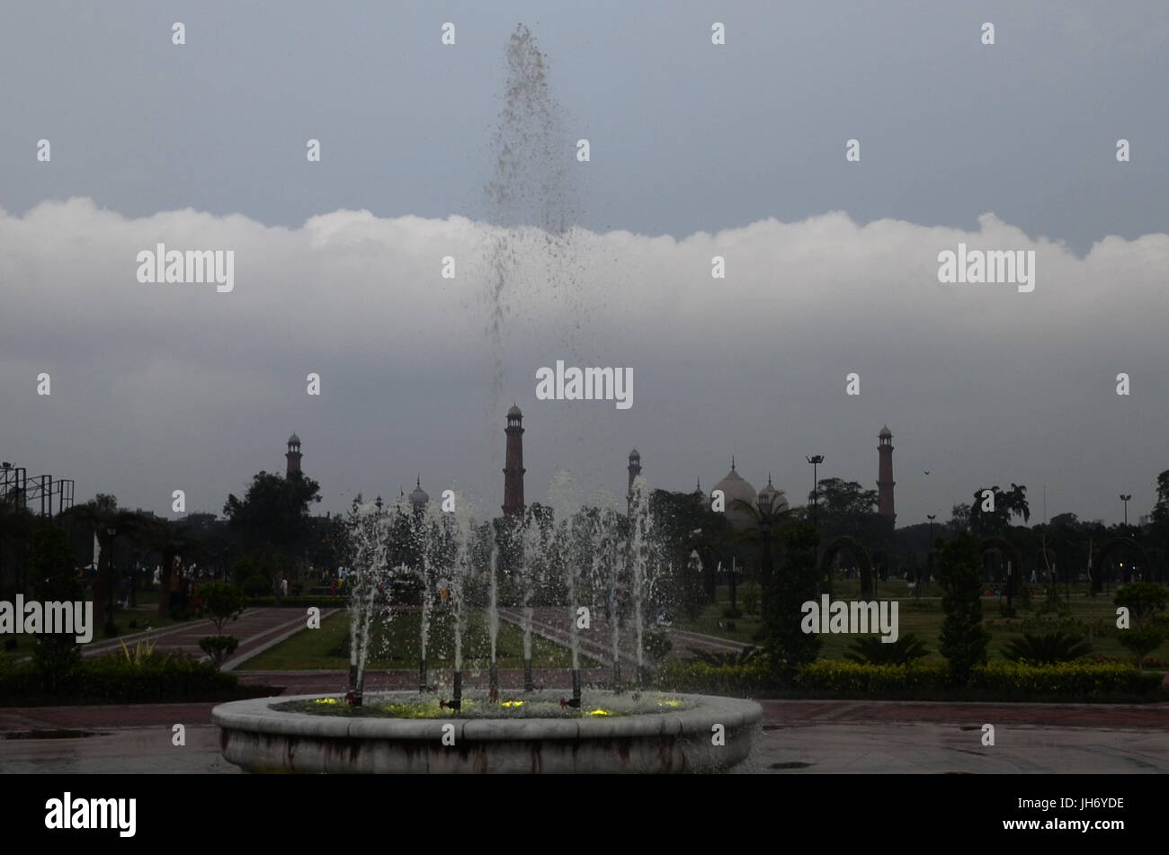 Lahore, Pakistan. 13th July, 2017. An eye catching view of dark clouds ...