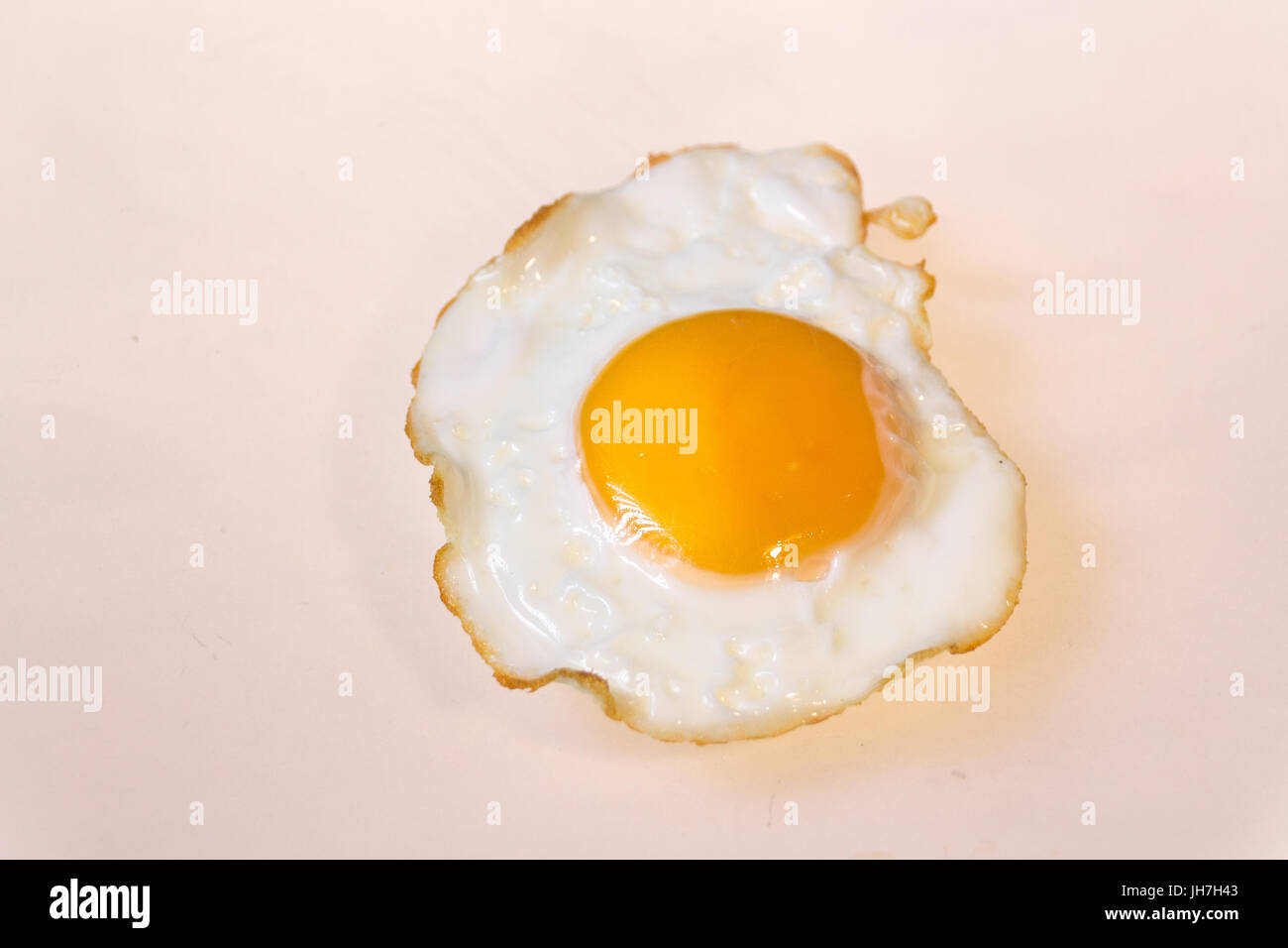 Photograph of a fried egg detail Stock Photo - Alamy