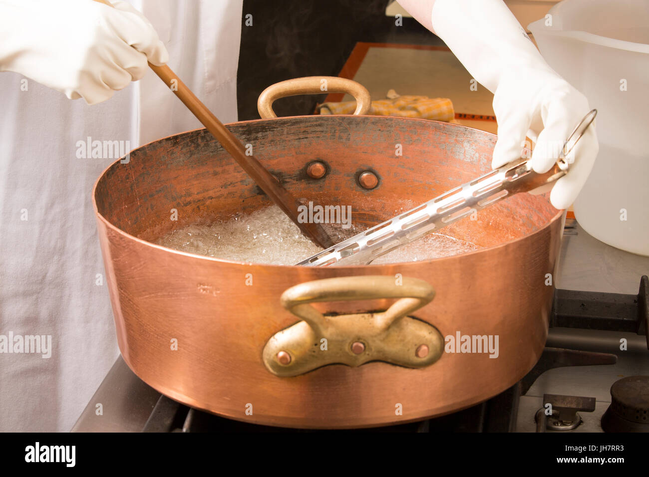 Factory of the production of delicious caramel candies. First step ...