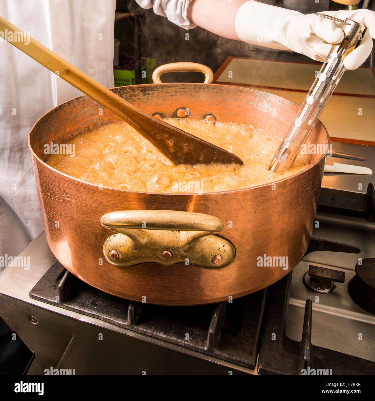 Factory of the production of delicious caramel candies. First step ...