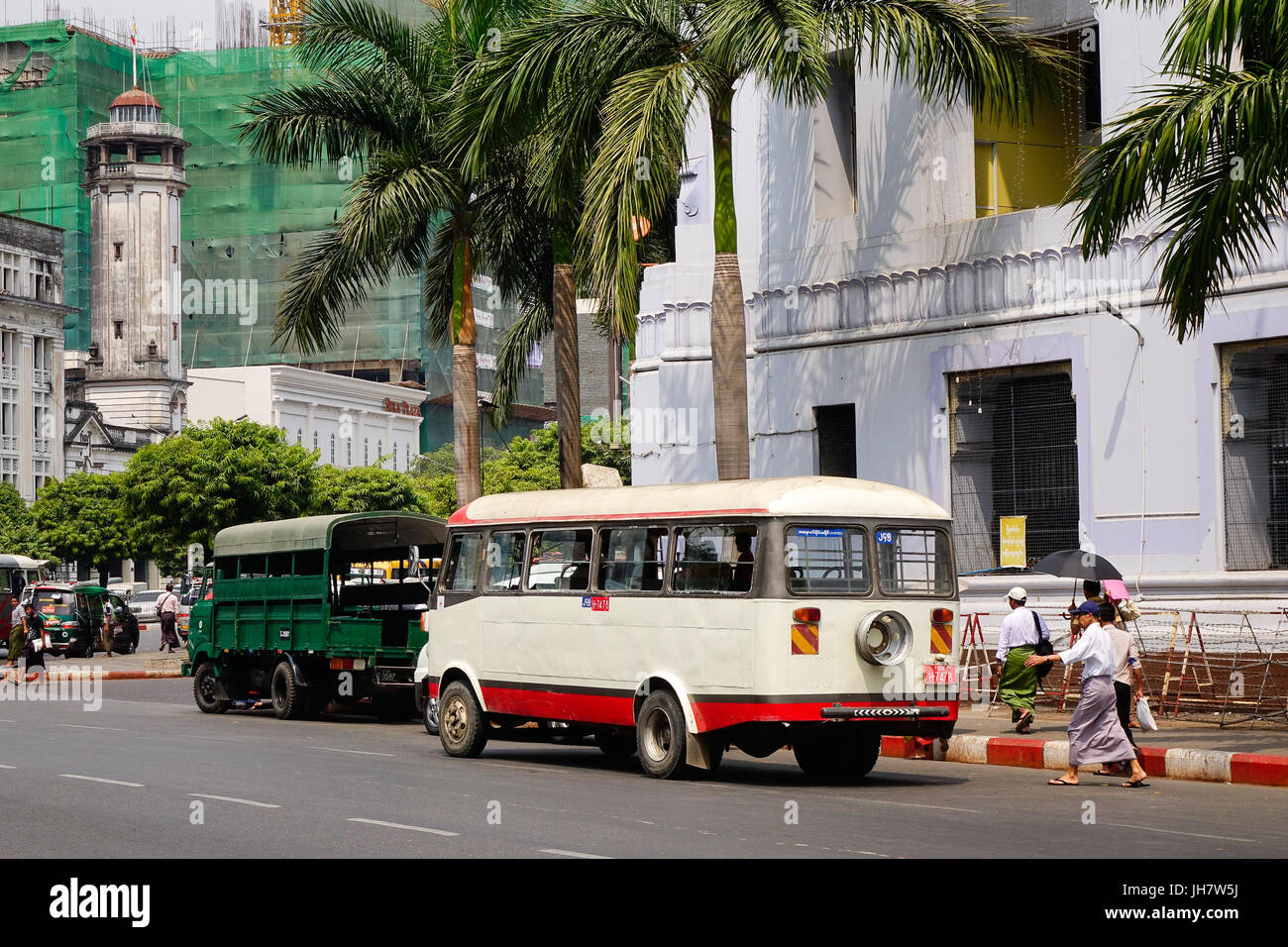 Yangon, Myanmar - Feb 26, 2016. Many cars run on main street at rush ...