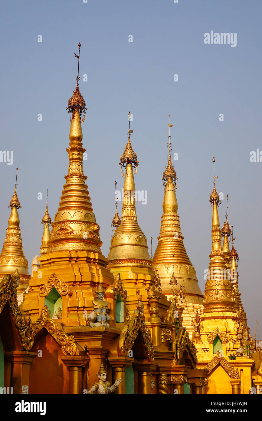 Top of golden stupas at Shwedagon Pagoda in Yangon, Myanmar. Shwedagon ...