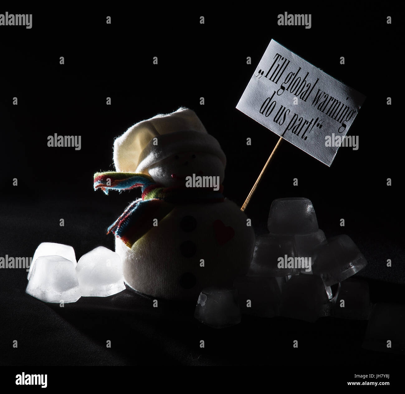 Contour of the snowman holding protest sign with text „Till global ...
