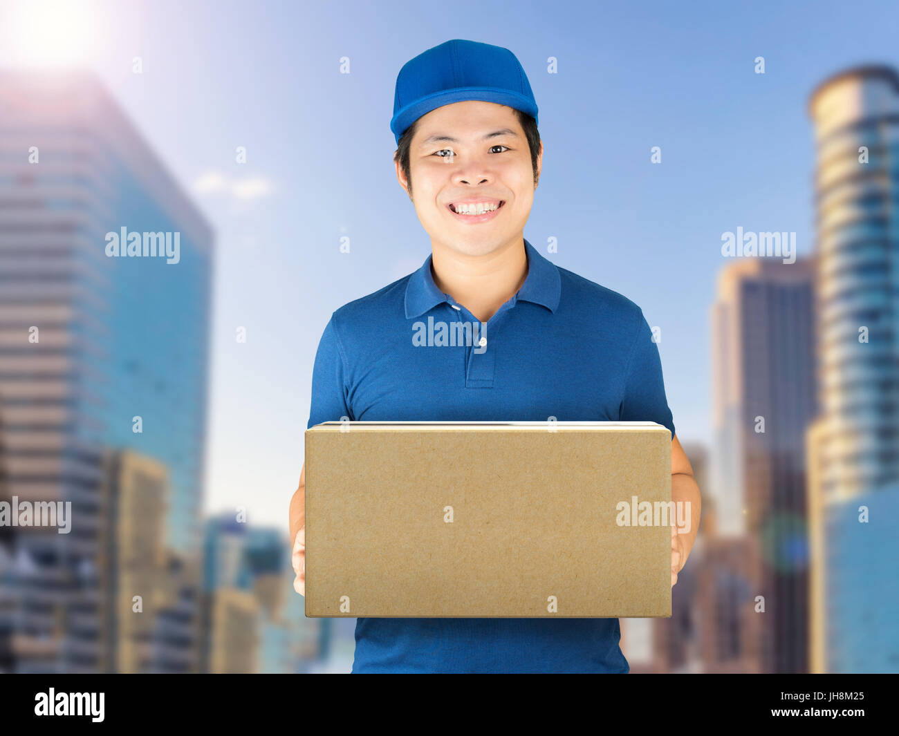 Asian delivery man hi-res stock photography and images - Alamy