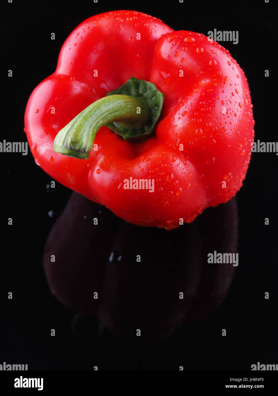 Pepper on a dark background Stock Photo - Alamy