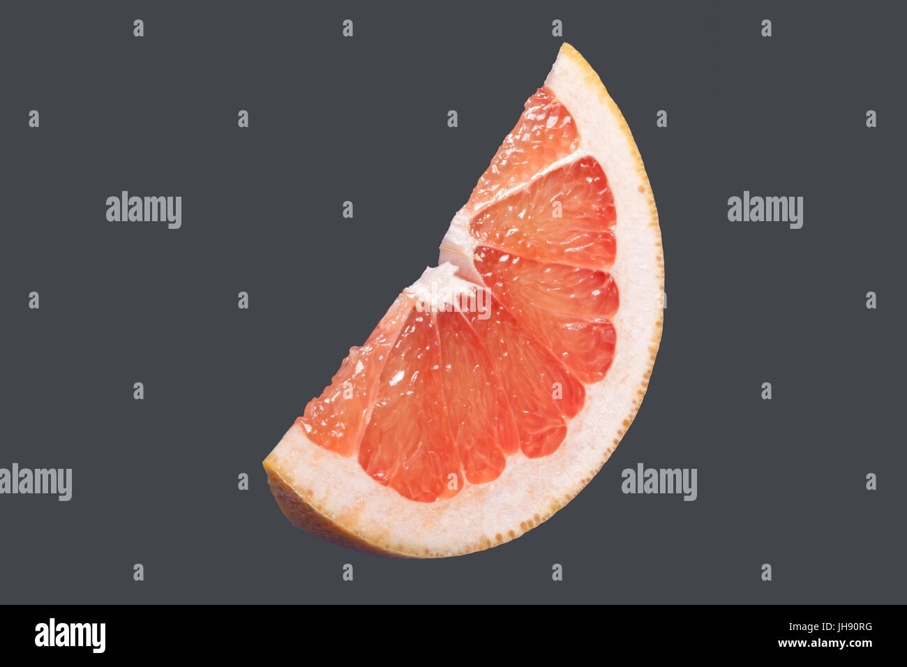 Parts of grapefruit on dark background. Studio shot retouched Stock ...