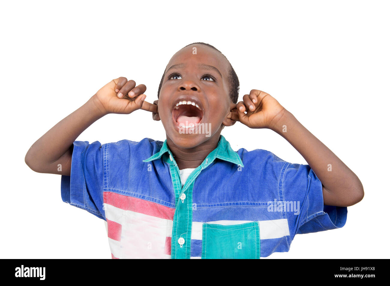 To scream loud , the child closes his ears Stock Photo - Alamy