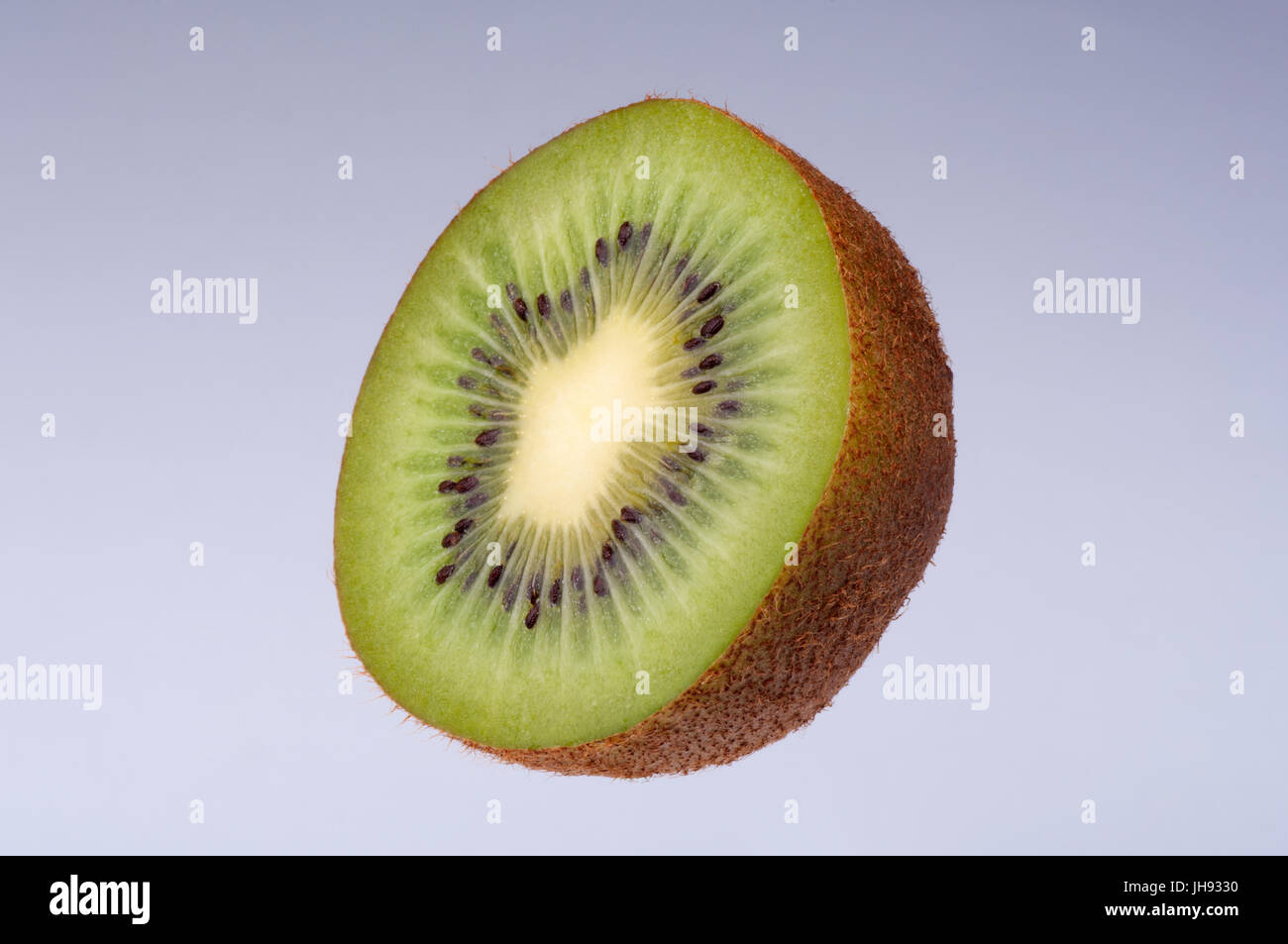 Ripe Juicy Kiwi Fruit, Half Full. Studio shoot retouched Stock Photo - Alamy