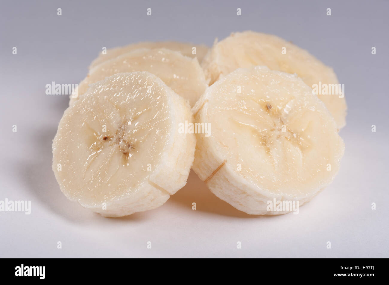 Tasty peeled banana round slice. Studio shoot Stock Photo - Alamy
