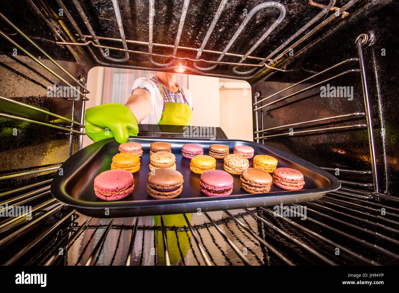 Baking macarons in the oven view from the inside of the oven. Cooking ...