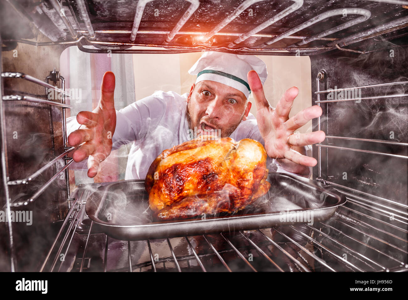 Funny man eating chicken hi-res stock photography and images - Alamy