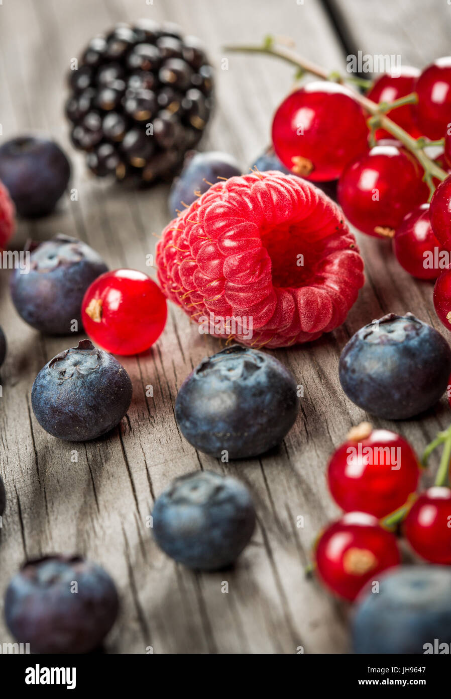 Fresh Berries and raspberry - Blueberries background closeup Stock ...