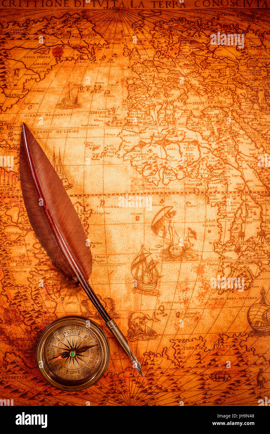 Vintage compass goose quill pen hi-res stock photography and images - Alamy